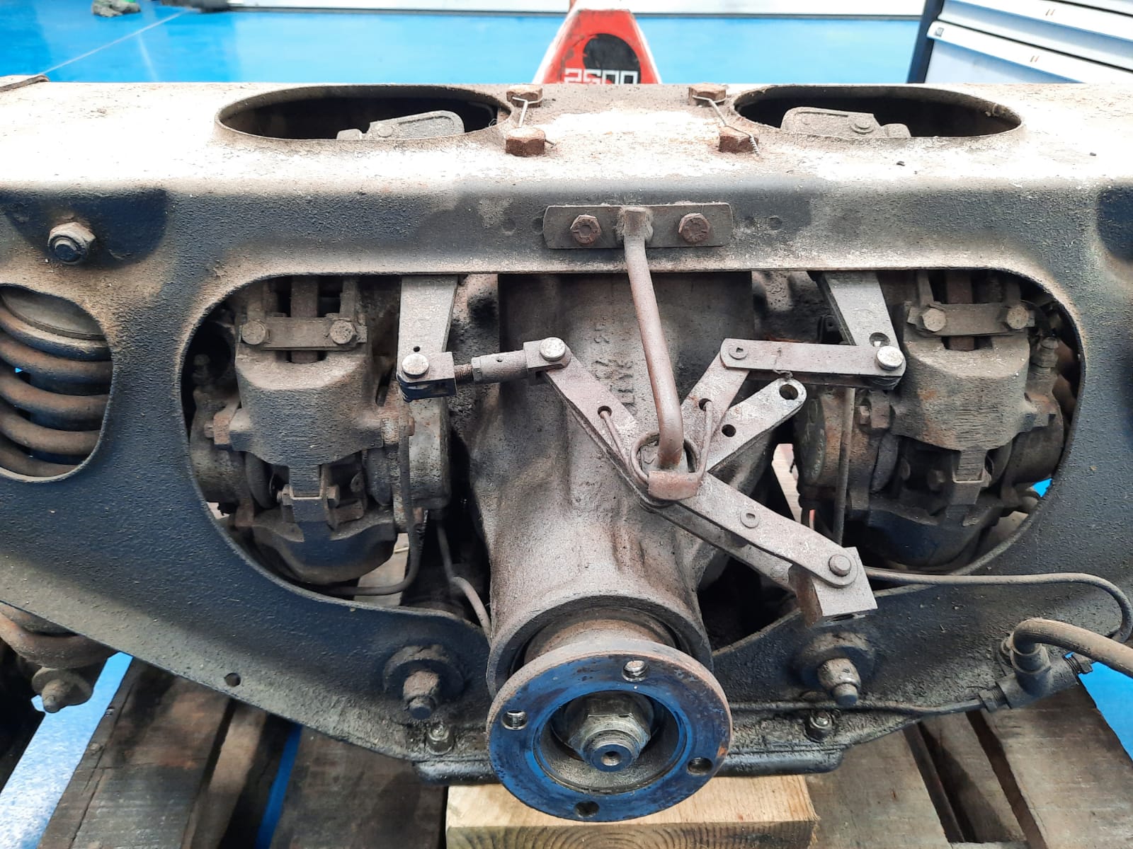 Burgundy E-Type Rear Axel Back In - Bridge Classic Cars