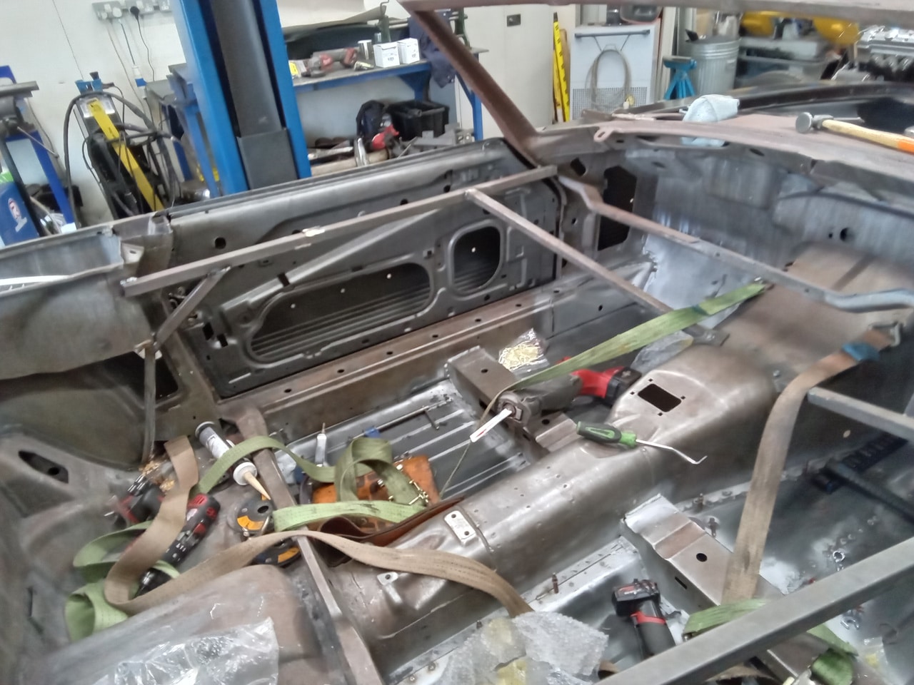 Correcting chassis on Mercedes SL350 - Bridge Classic Cars